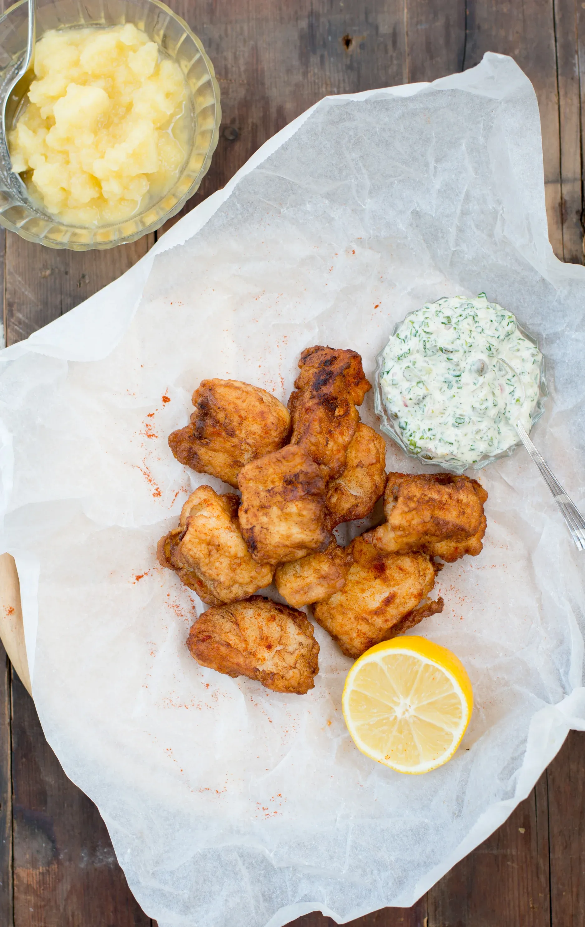 Icelandic fried cod (kibbeling) with ravigote sauce and applesauce.