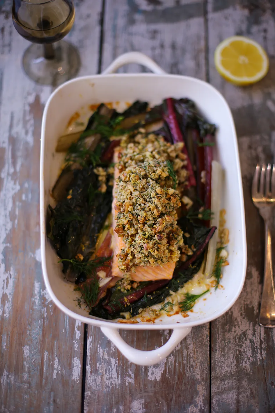 Oven-baked salmon with walnut crumble and Swiss chard